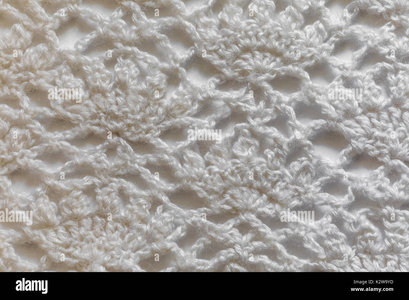 White handmade lace tablecloth texture on white background Stock Photo ...