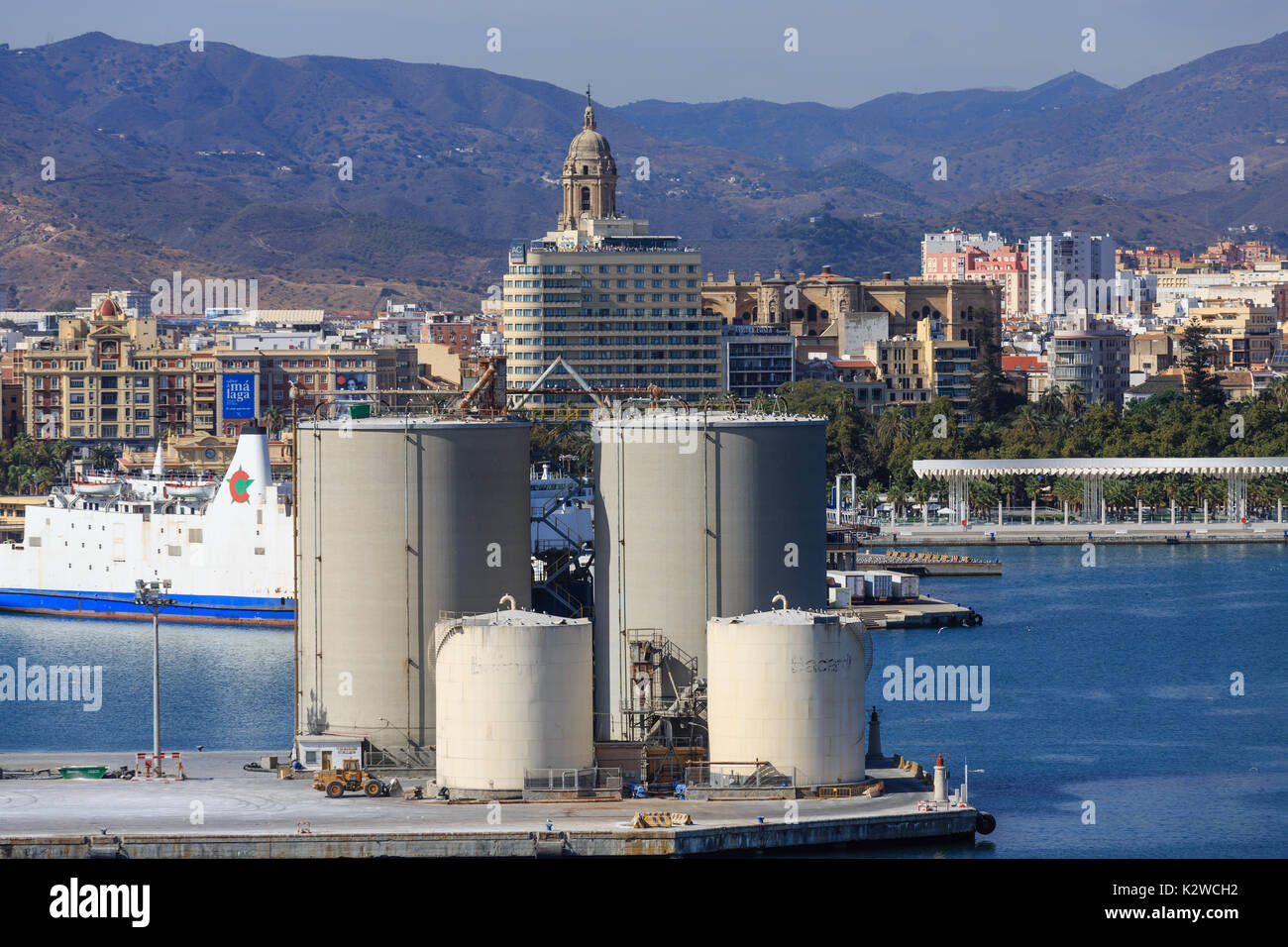 Concrete Shipping Tanks in Malaga Harbor Stock Photo - Alamy