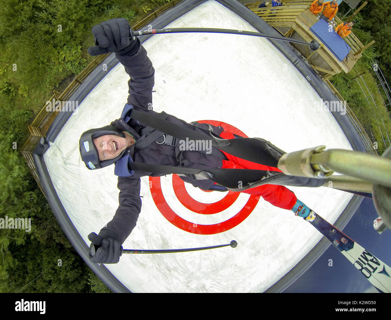 Eddie the Eagle has his skis and poles at the ready as he prepares to ...