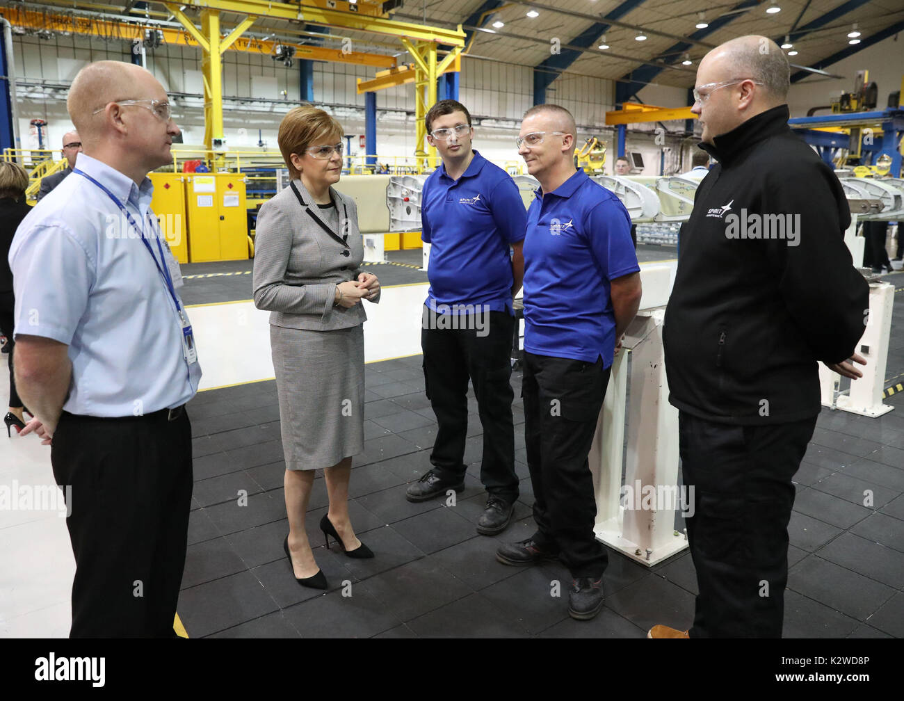 First Minister Nicola Sturgeon talks to staff as she views aircraft ...