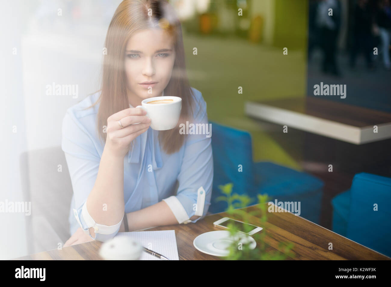 Female sad coffee shop hi-res stock photography and images - Alamy