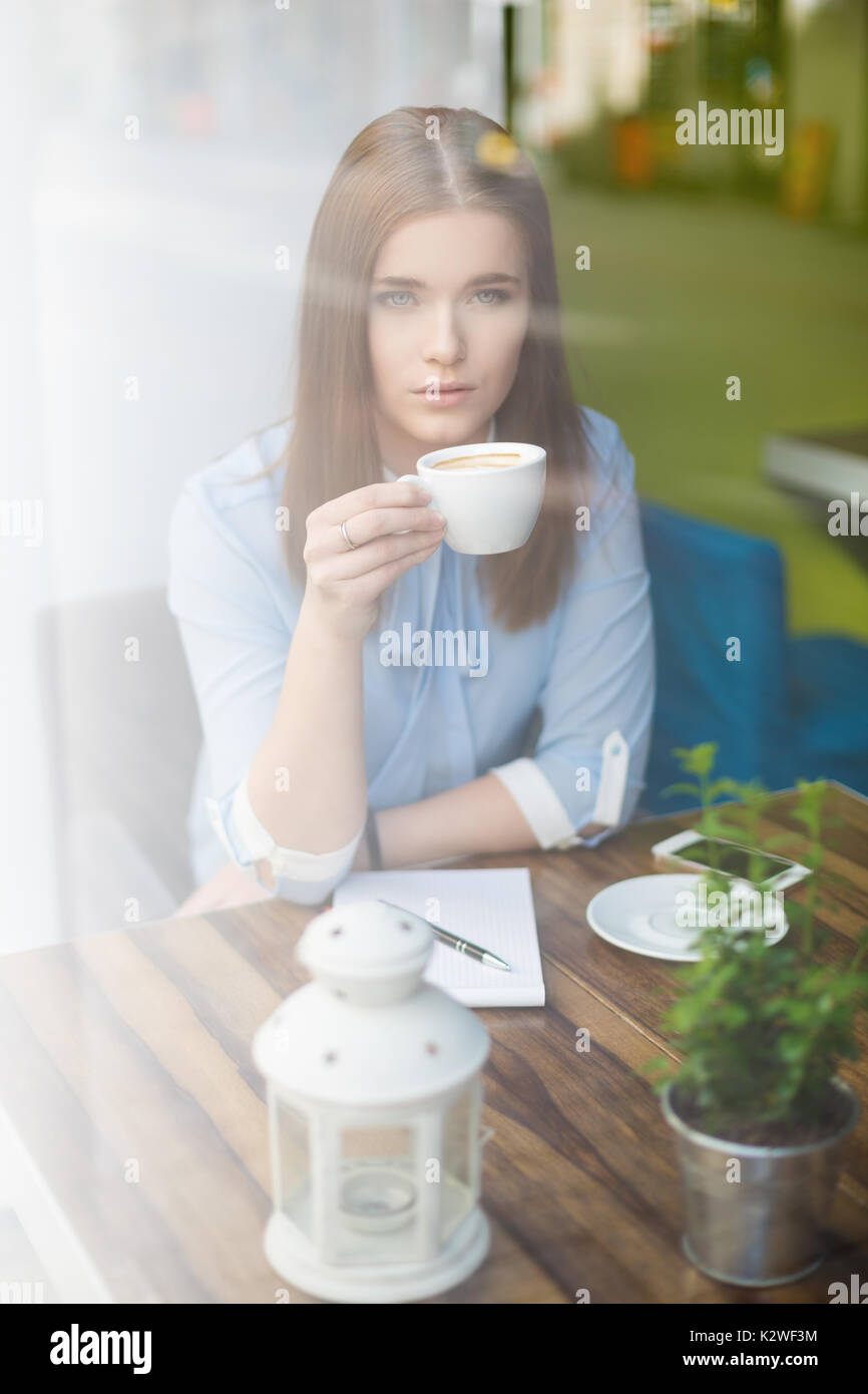 Female sad coffee shop hi-res stock photography and images - Alamy