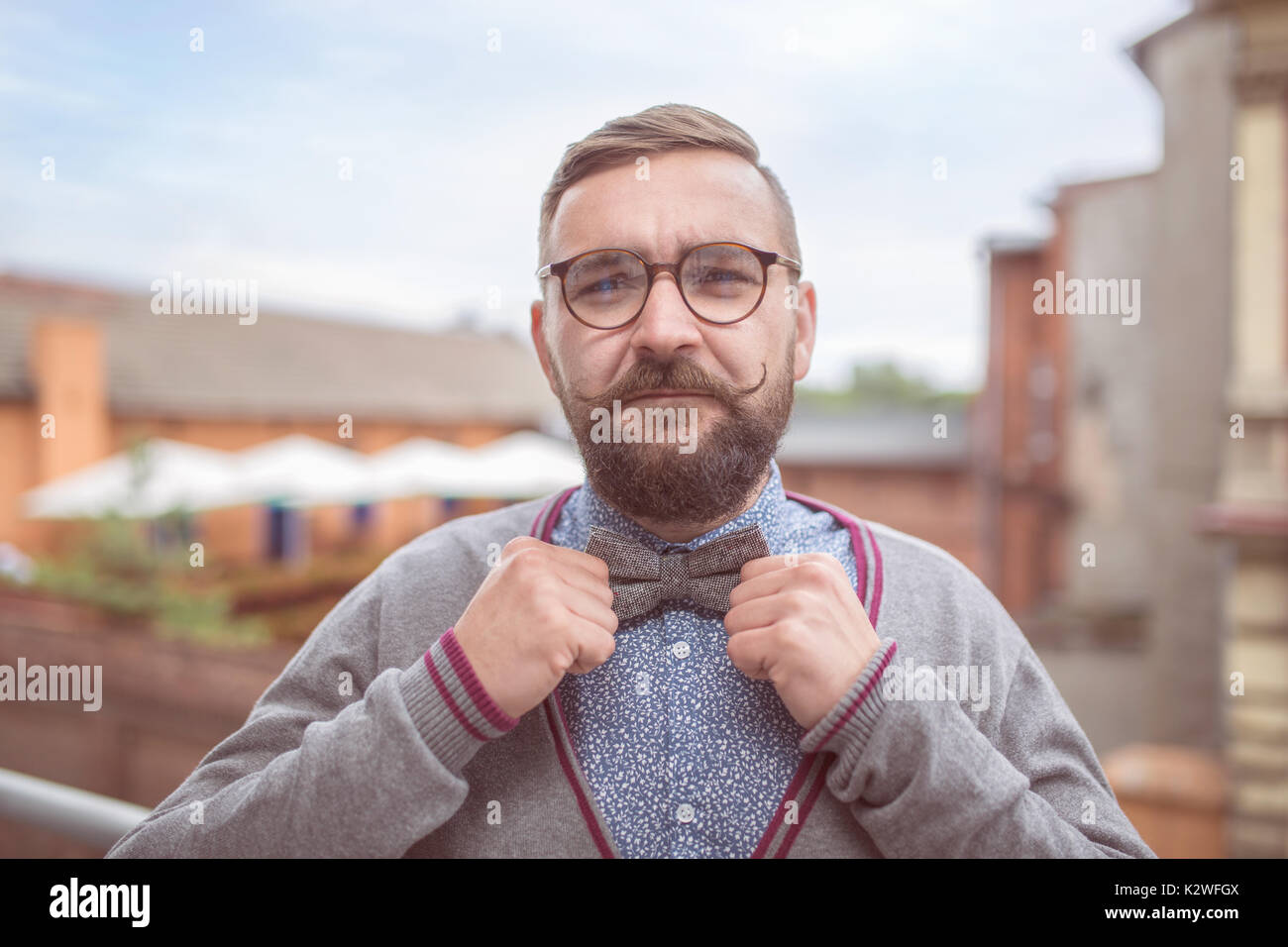 Man wearing bow tie hi-res stock photography and images - Alamy