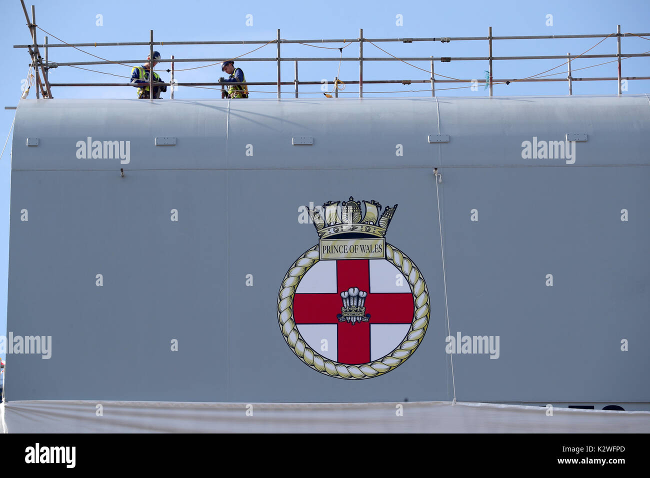 The crest on the side of the HMS Prince of Wales in Rosyth Dockyard ...