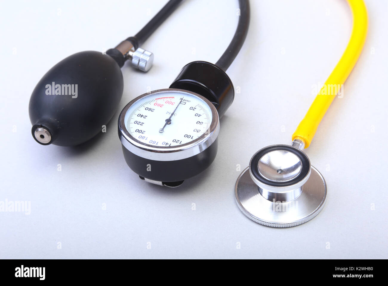 Medical stethoscope and blood pressure meter isolated on white ...