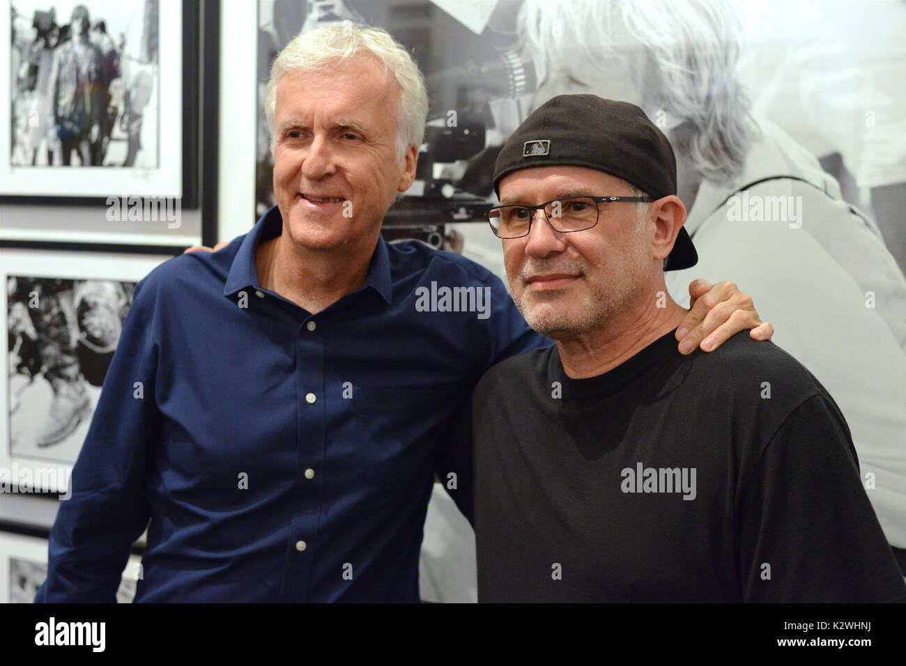(L-R) Filmmaker James Cameron and Photographer Chris Cuffaro attends ...