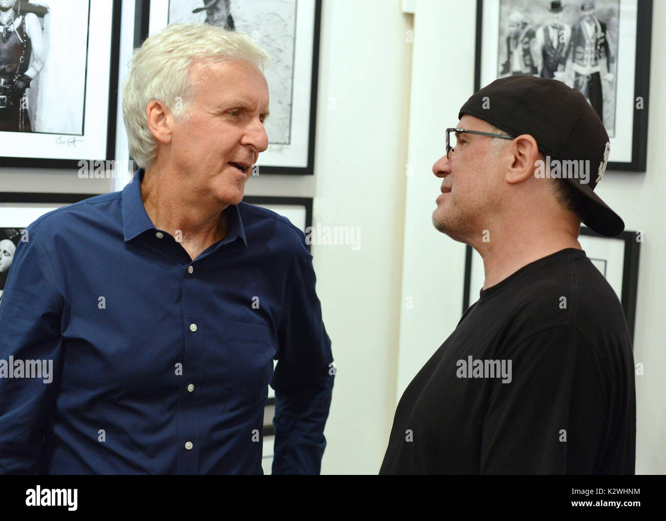 (L-R) Filmmaker James Cameron Photographer Chris Cuffaro attends VIP ...