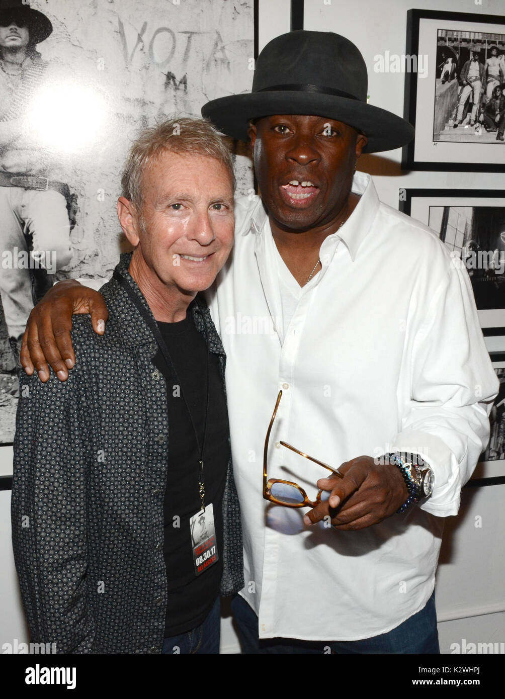 (L-R) Owner of Mr. Musichead Sam Milgrom and Vince Wilburn Jr. attends ...