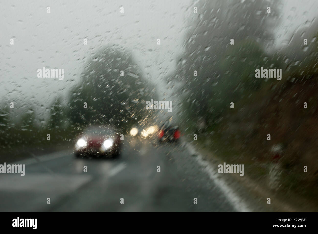 Rain on a car window Stock Photo - Alamy
