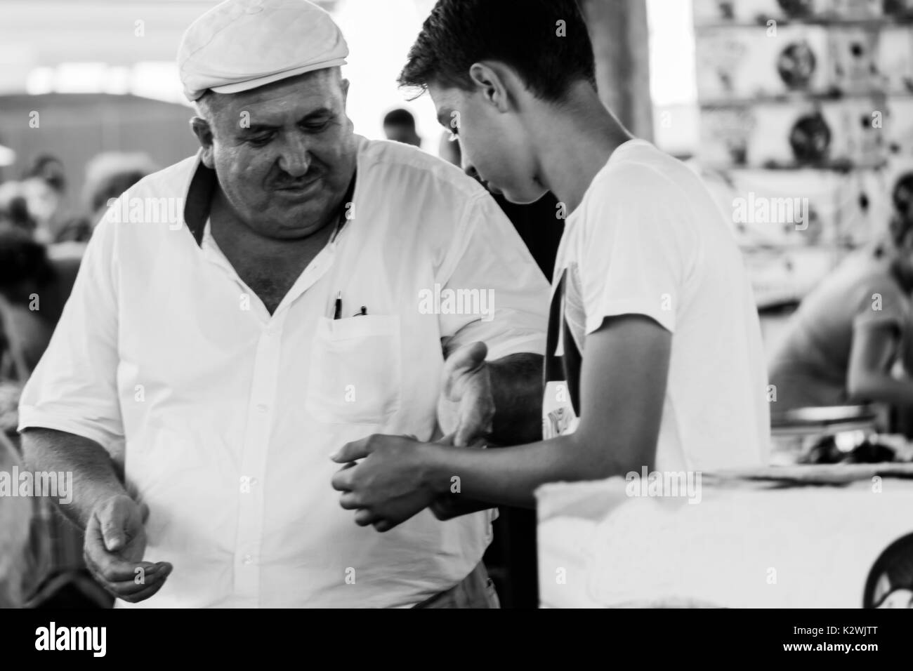 Man talking boy Black and White Stock Photos & Images - Alamy