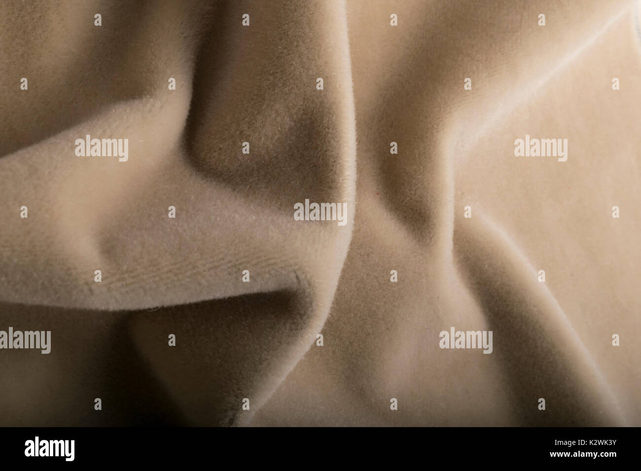 Velour beige fabric textile background. with velvet effect Stock Photo ...