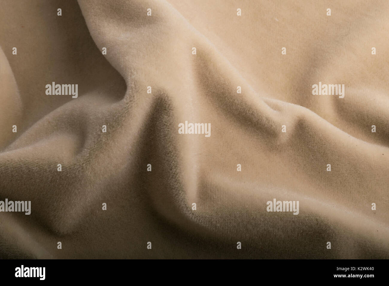 Velour beige fabric textile background. with velvet effect Stock Photo ...