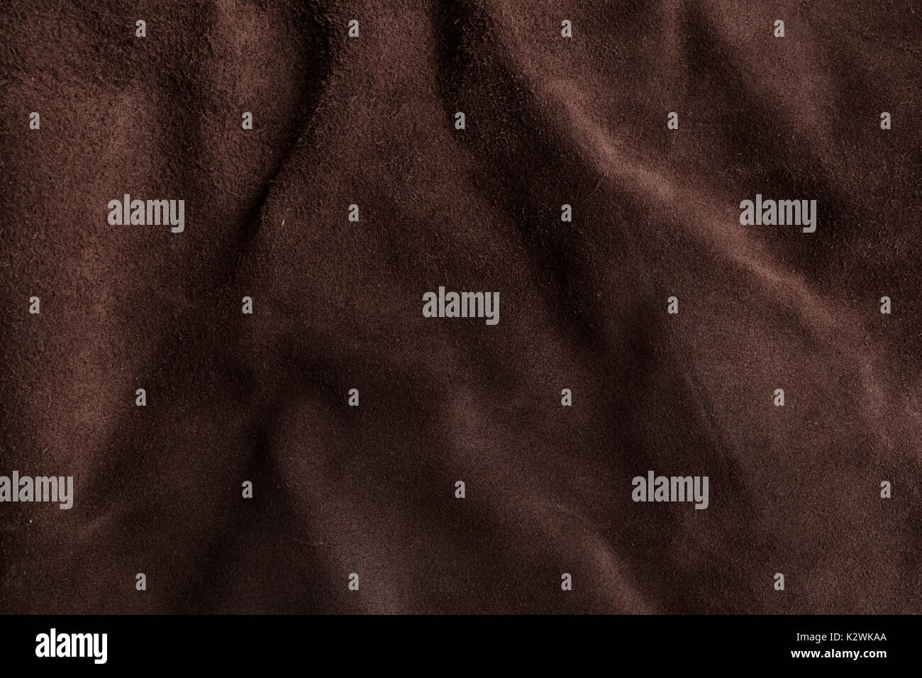 Bumpy soft brown chamois leather texture background Stock Photo - Alamy