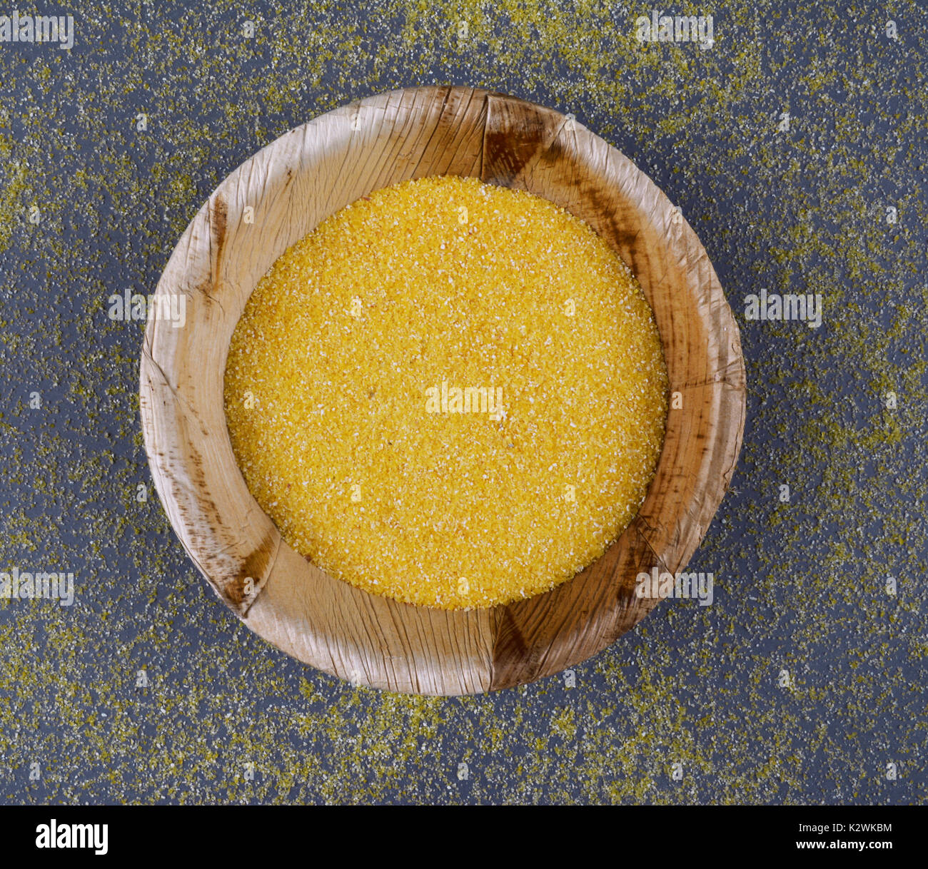 Corn meal of dry polenta on dark background. Flat lay style Stock Photo ...