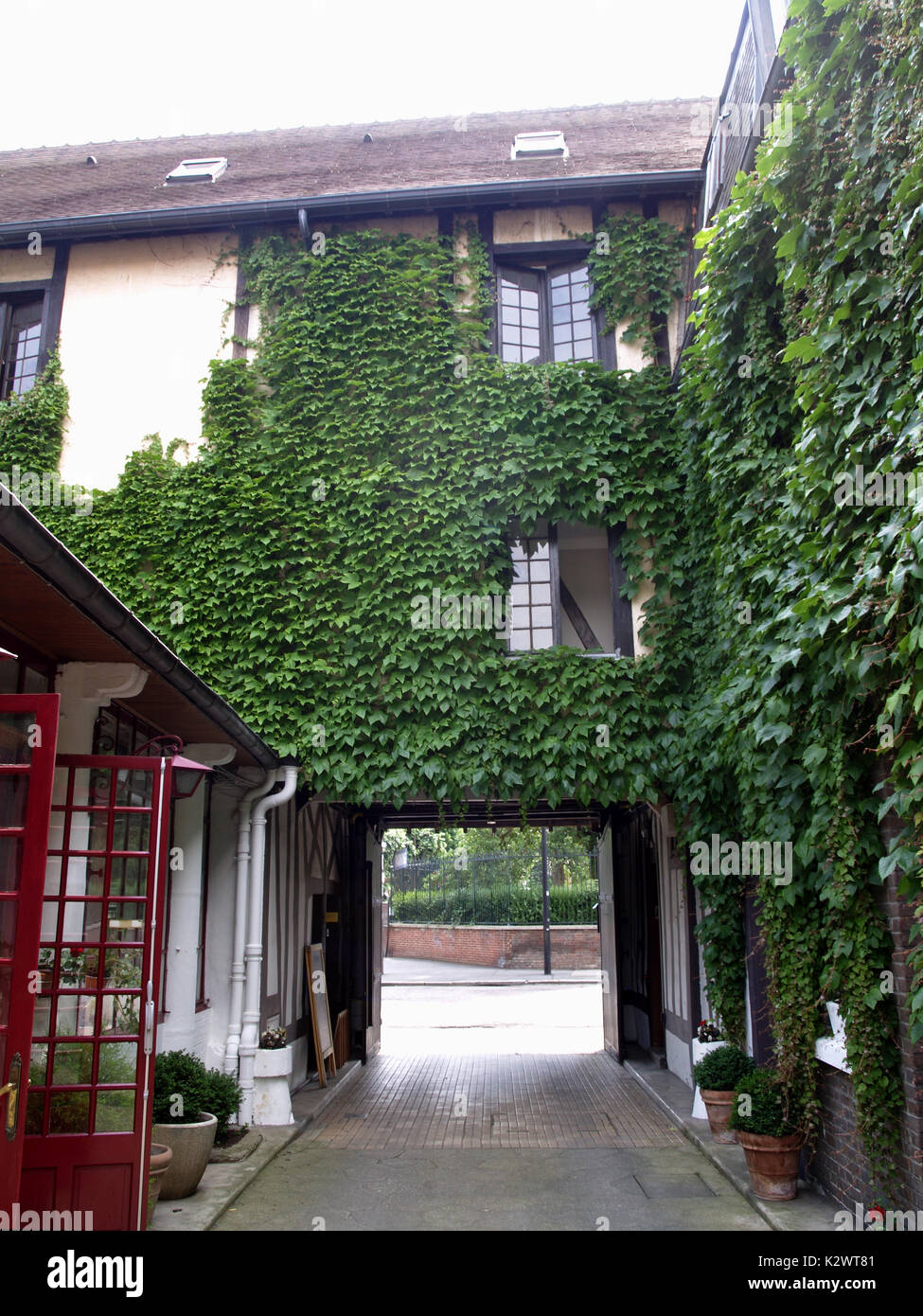 Ivy clad rear courtyard of the Hotel de Normandie in Evreux, Upper ...
