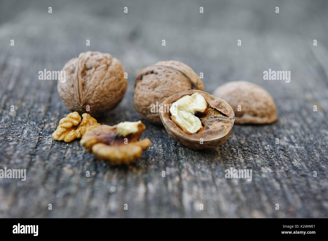 Walnuts old wooden plank hi-res stock photography and images - Alamy