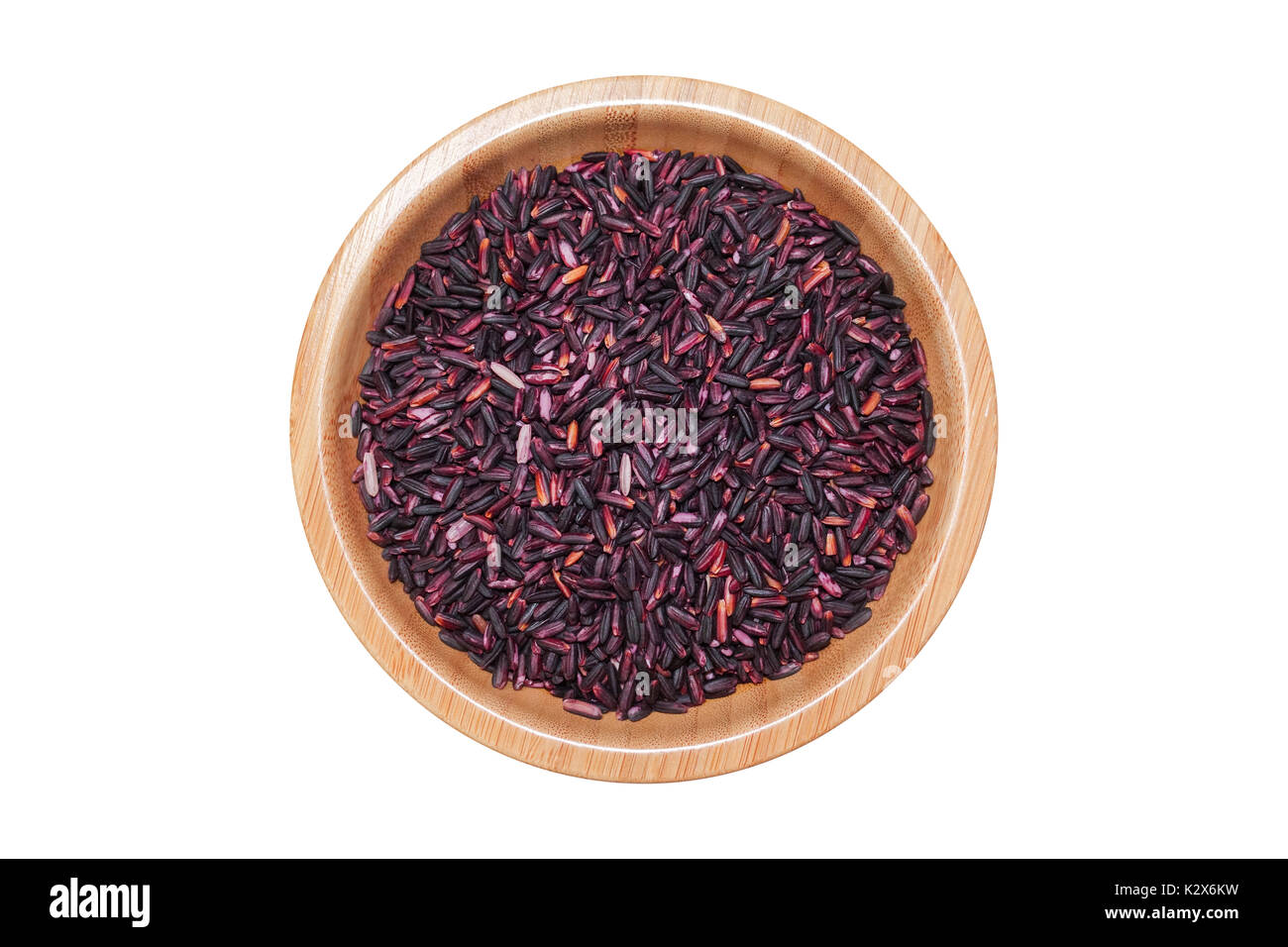 Thai black jasmine rice or Rice berry in wooden bowl isolated on white ...