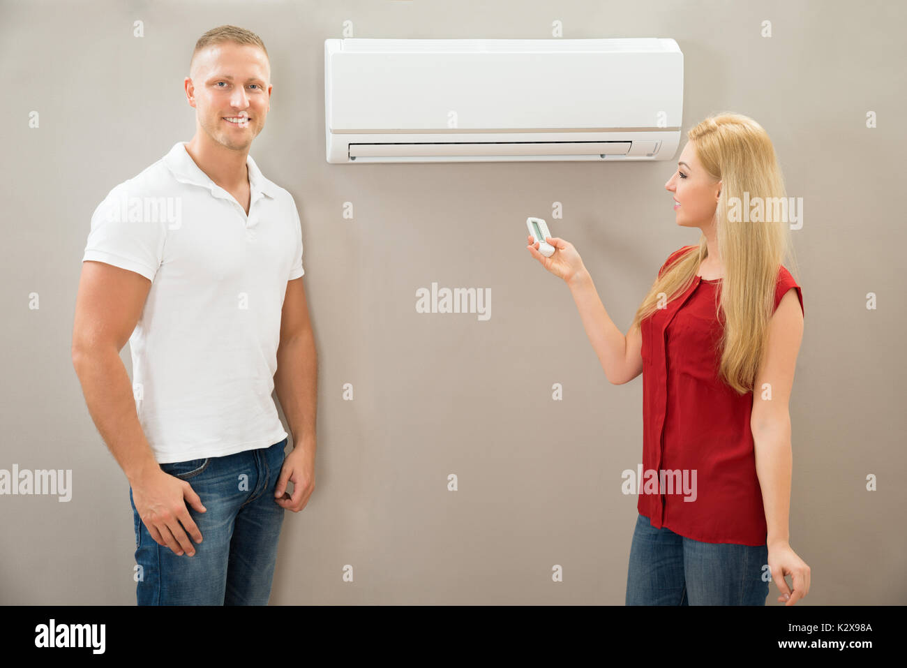 Man using air conditioner hi-res stock photography and images - Alamy