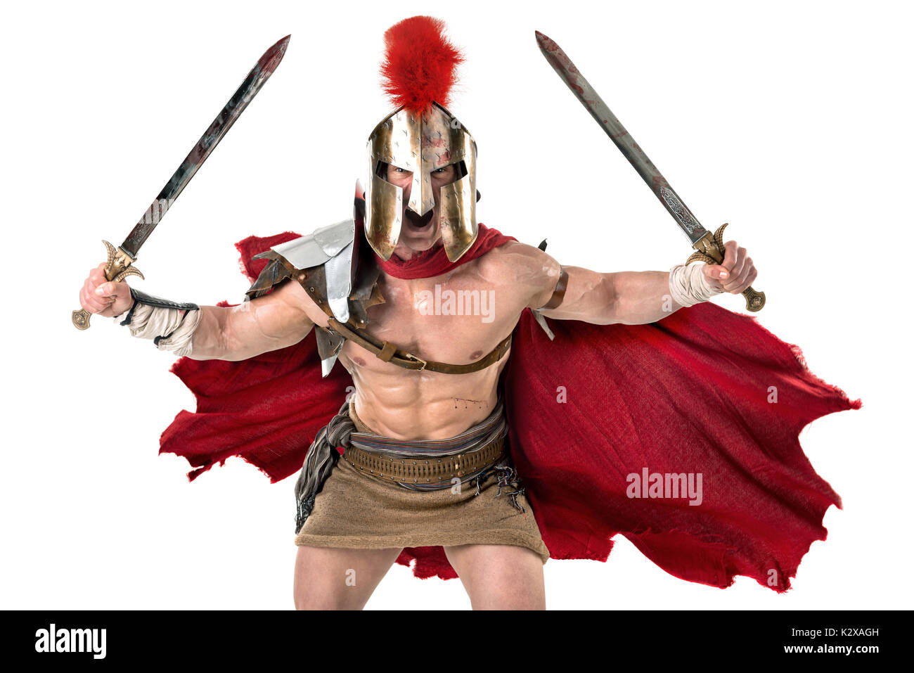 Ancient warrior or Gladiator posing over a white background Stock Photo ...