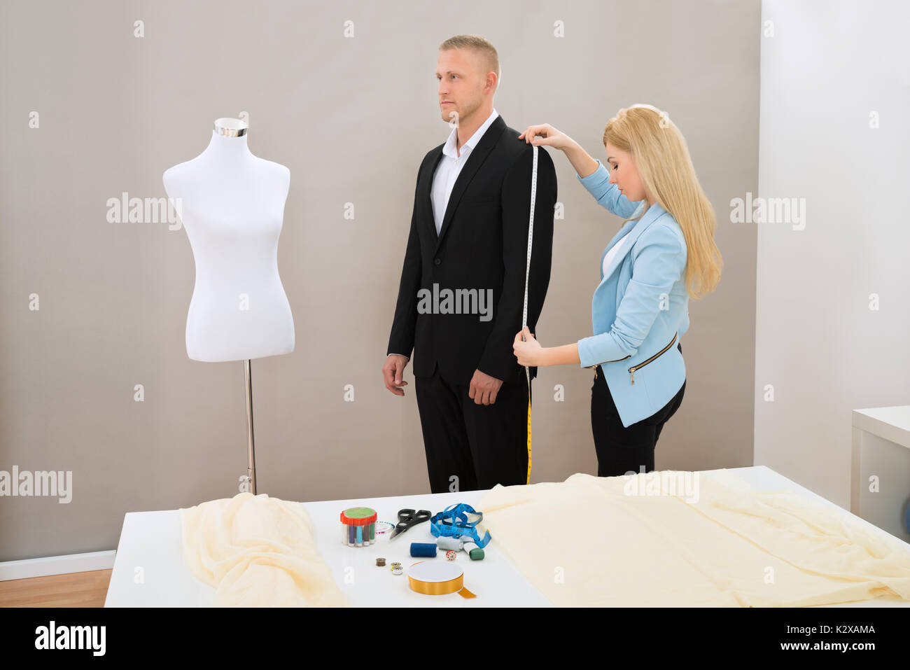 Tailor measuring suit hi-res stock photography and images - Alamy
