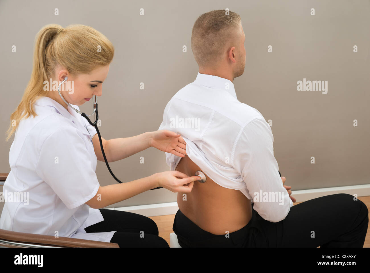Medical checkup stethoscope female physician hi-res stock photography and images - Alamy