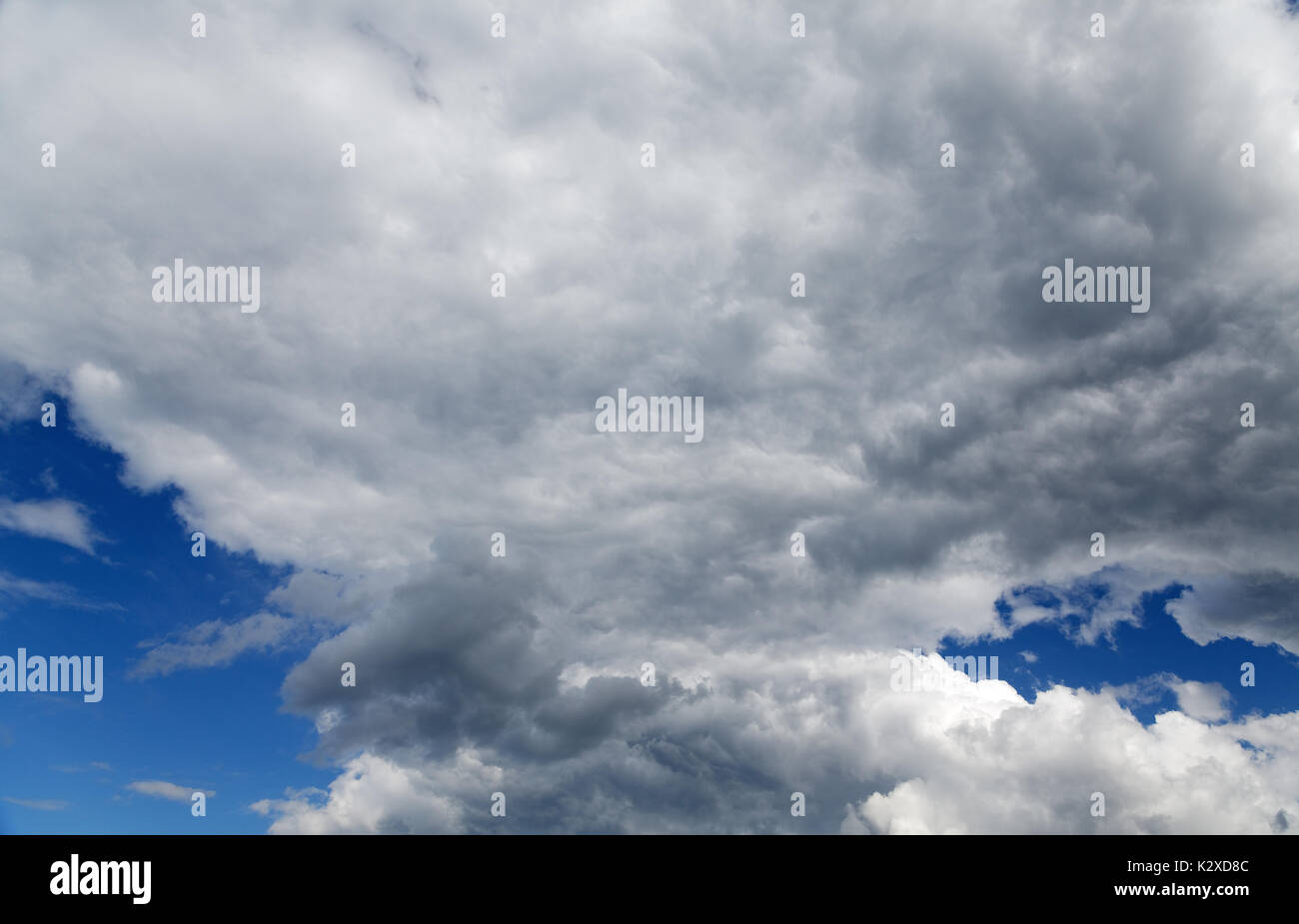 stratocumulus clouds and the dark blue sky Stock Photo - Alamy