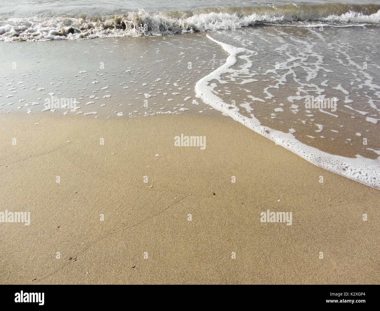 the sea long the shoreline from an Italian beach Stock Photo - Alamy