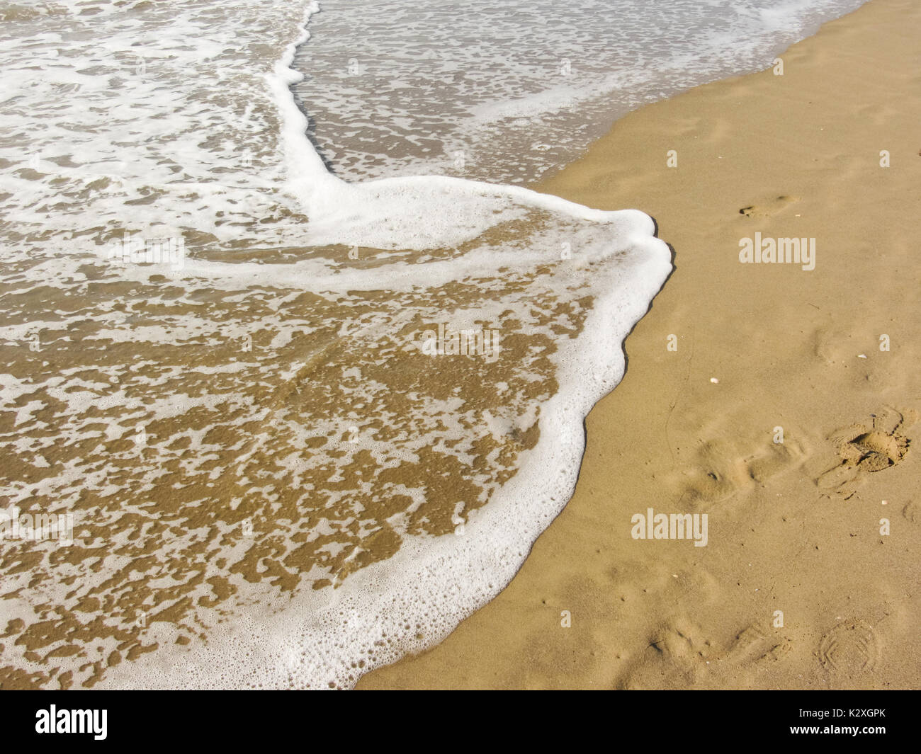 the sea long the shoreline from an Italian beach Stock Photo - Alamy