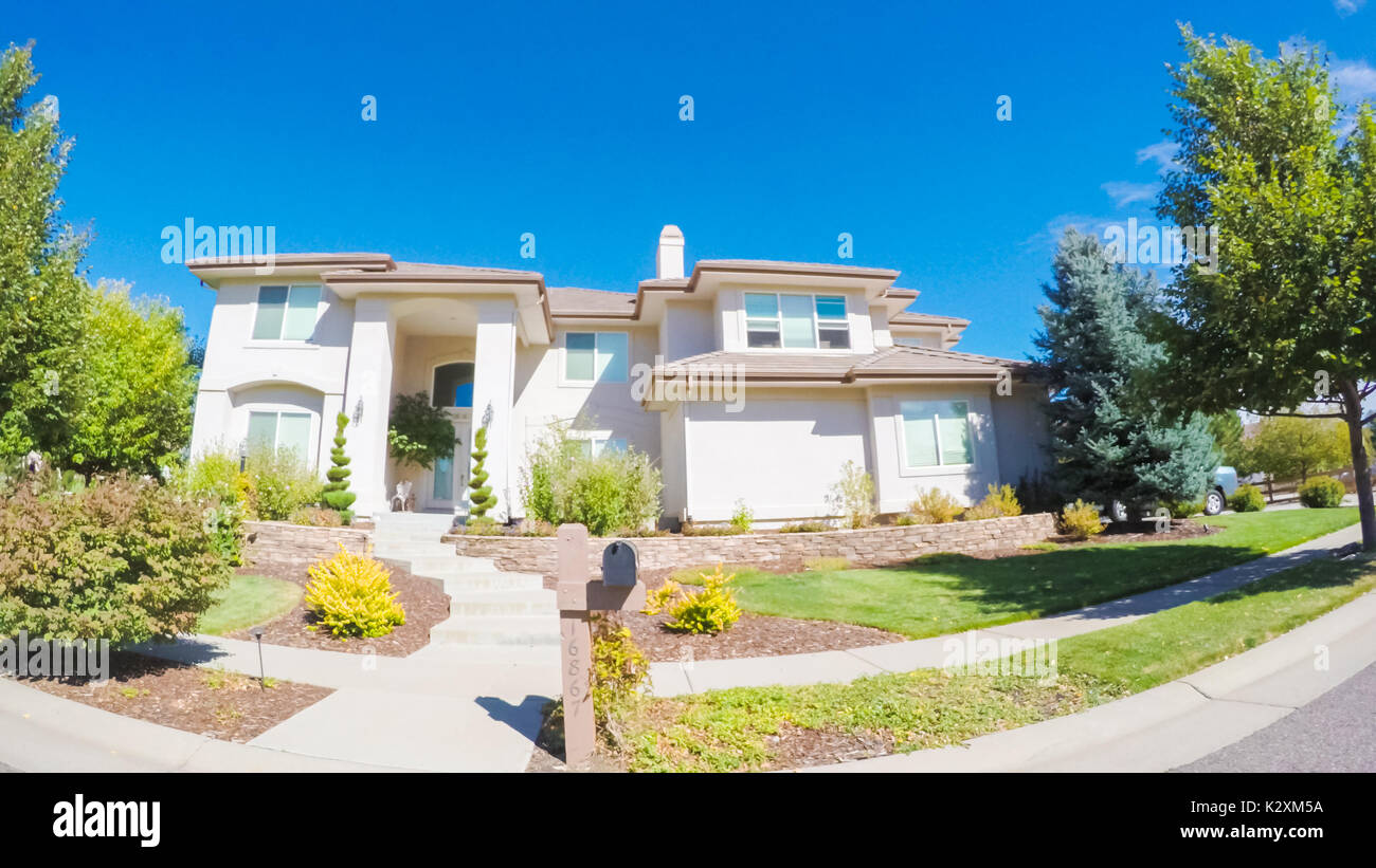 Driving through residential neighborhood in suburbia Stock Photo - Alamy