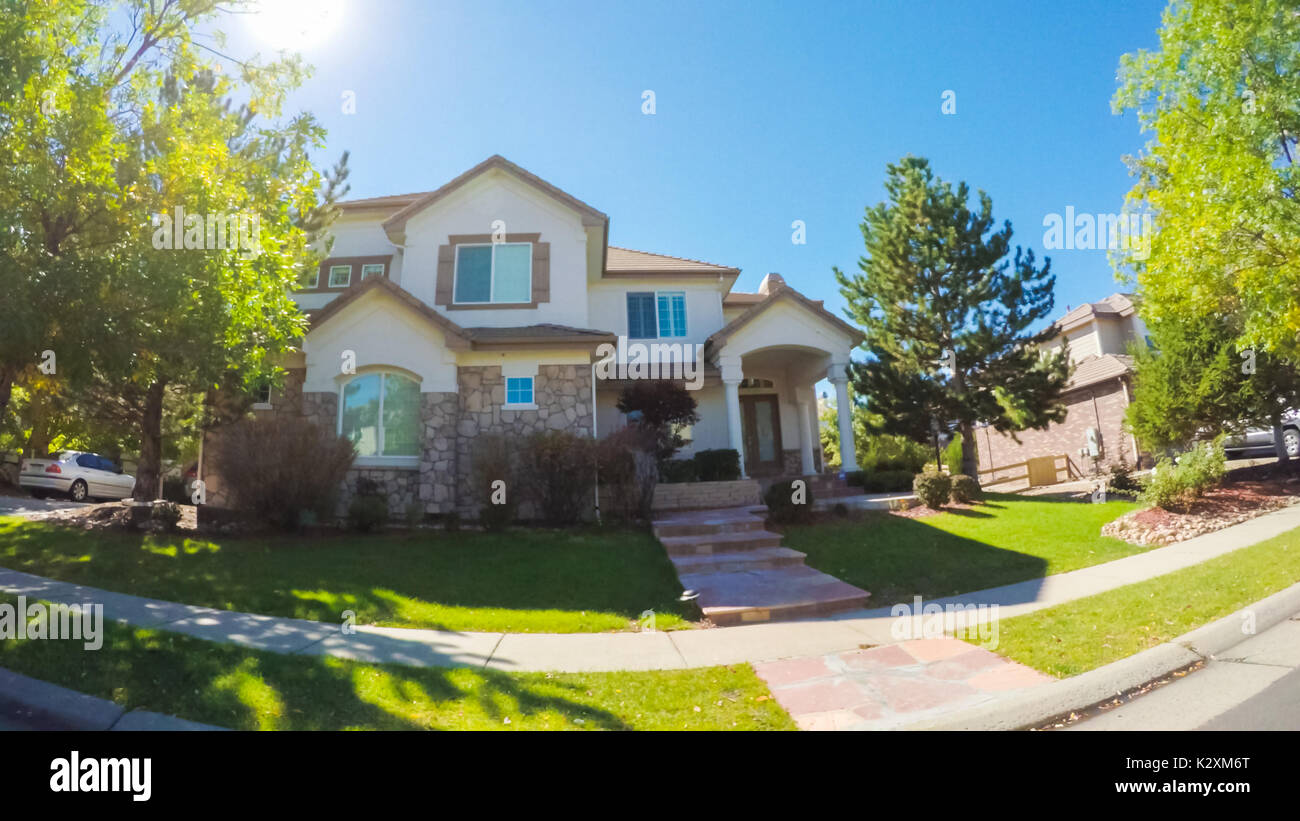 Driving through residential neighborhood in suburbia Stock Photo - Alamy
