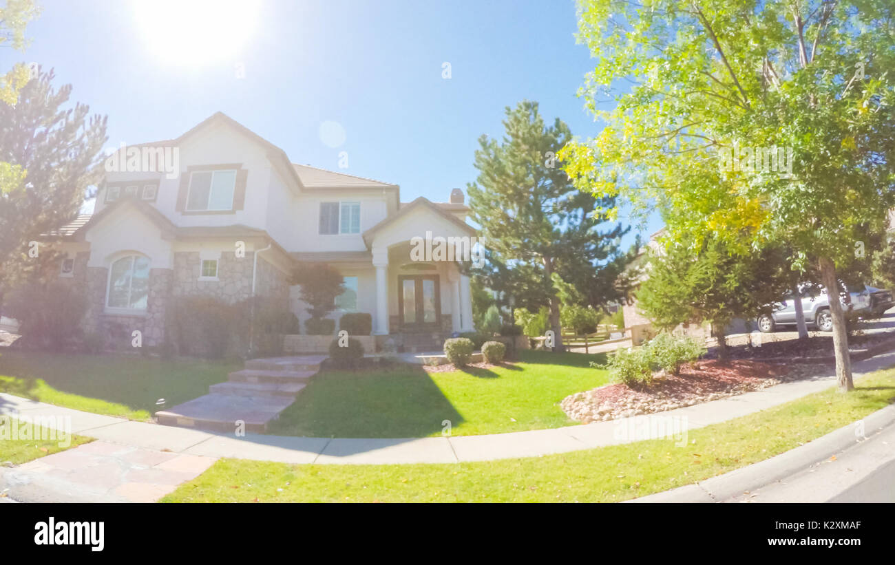 Driving through residential neighborhood in suburbia Stock Photo - Alamy