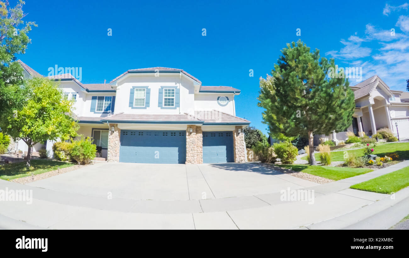 Driving through residential neighborhood in suburbia Stock Photo - Alamy