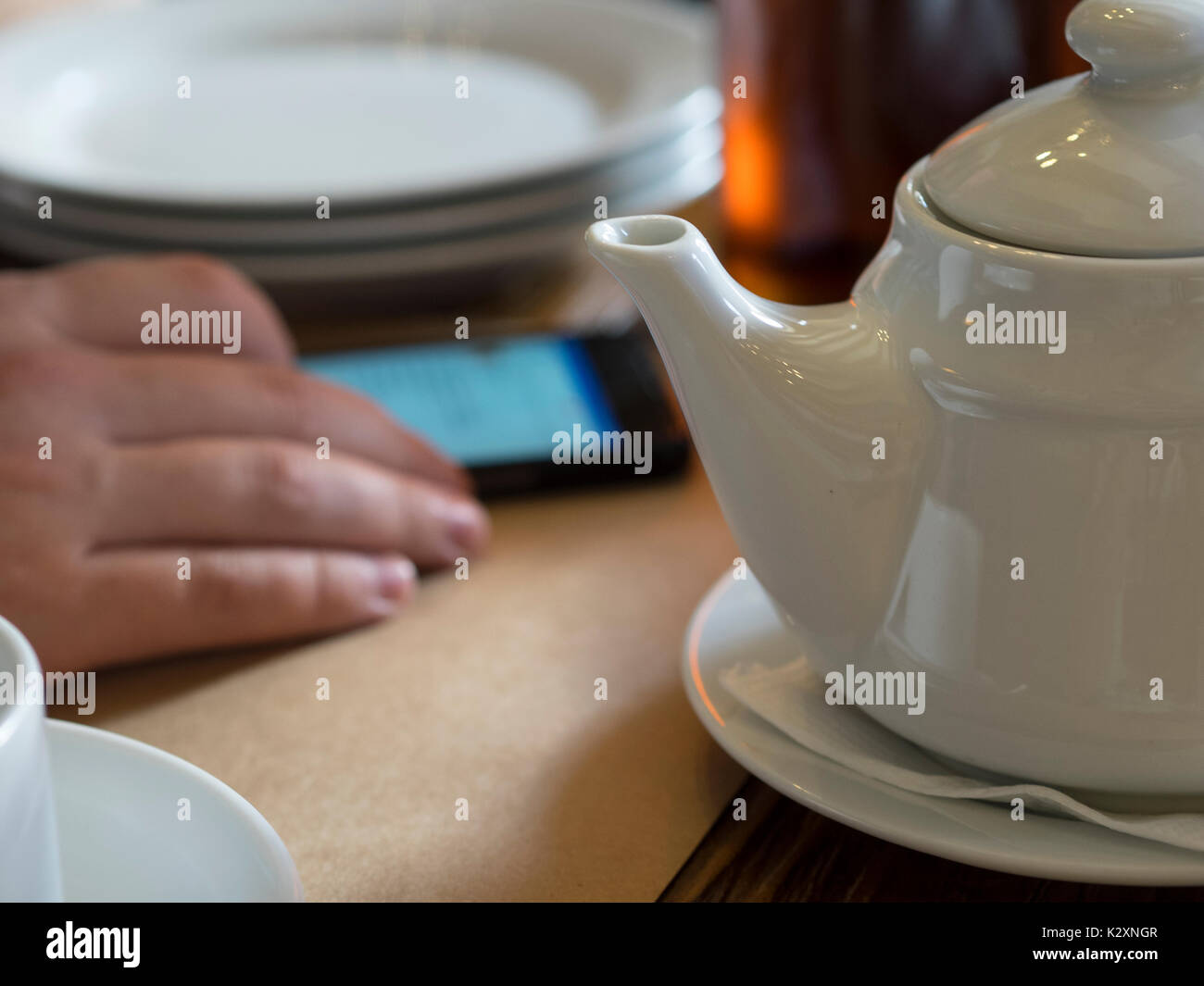 Using a teapot hi-res stock photography and images - Alamy