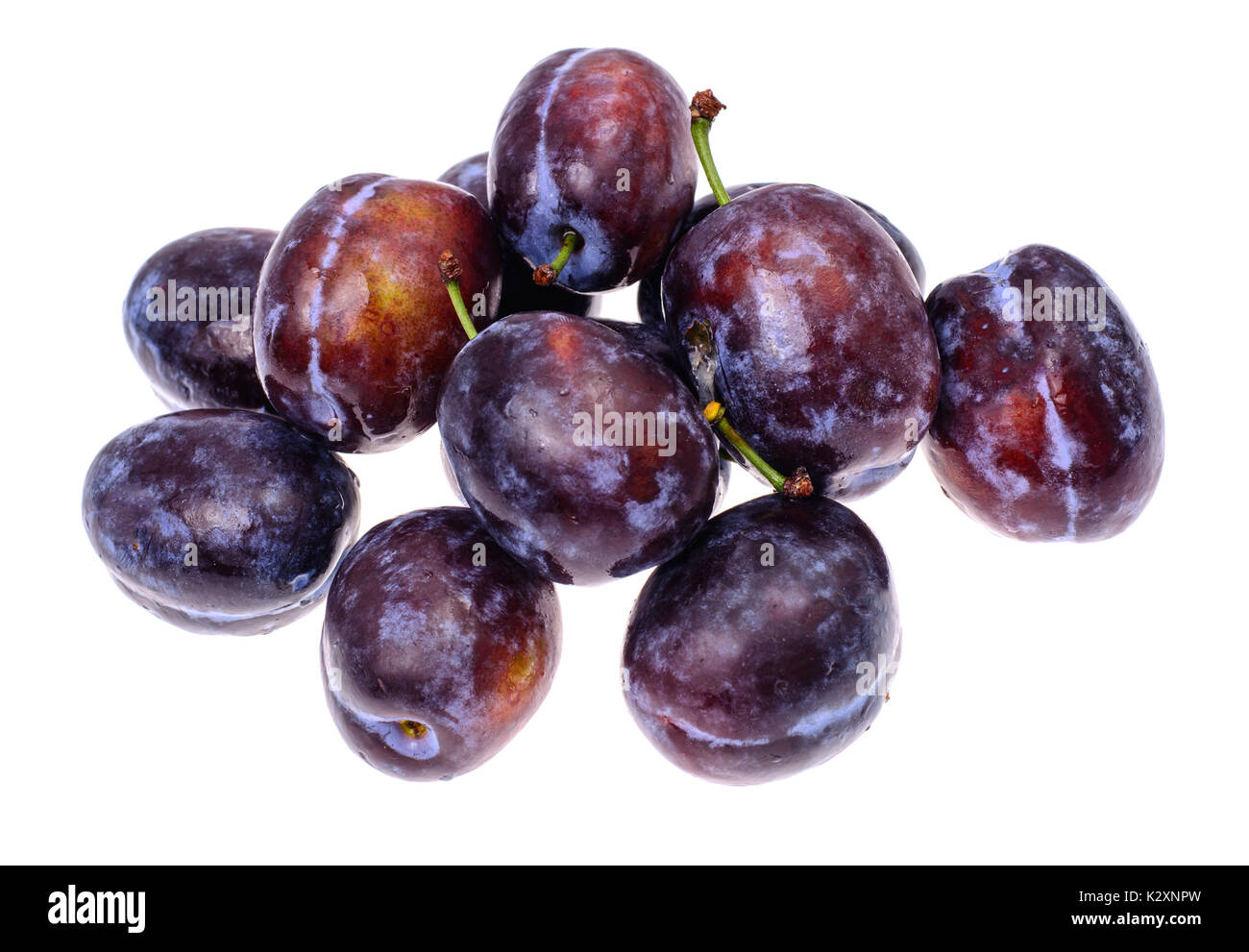 Prunes whole and cut, isolated on white background. Studio Photo Stock ...