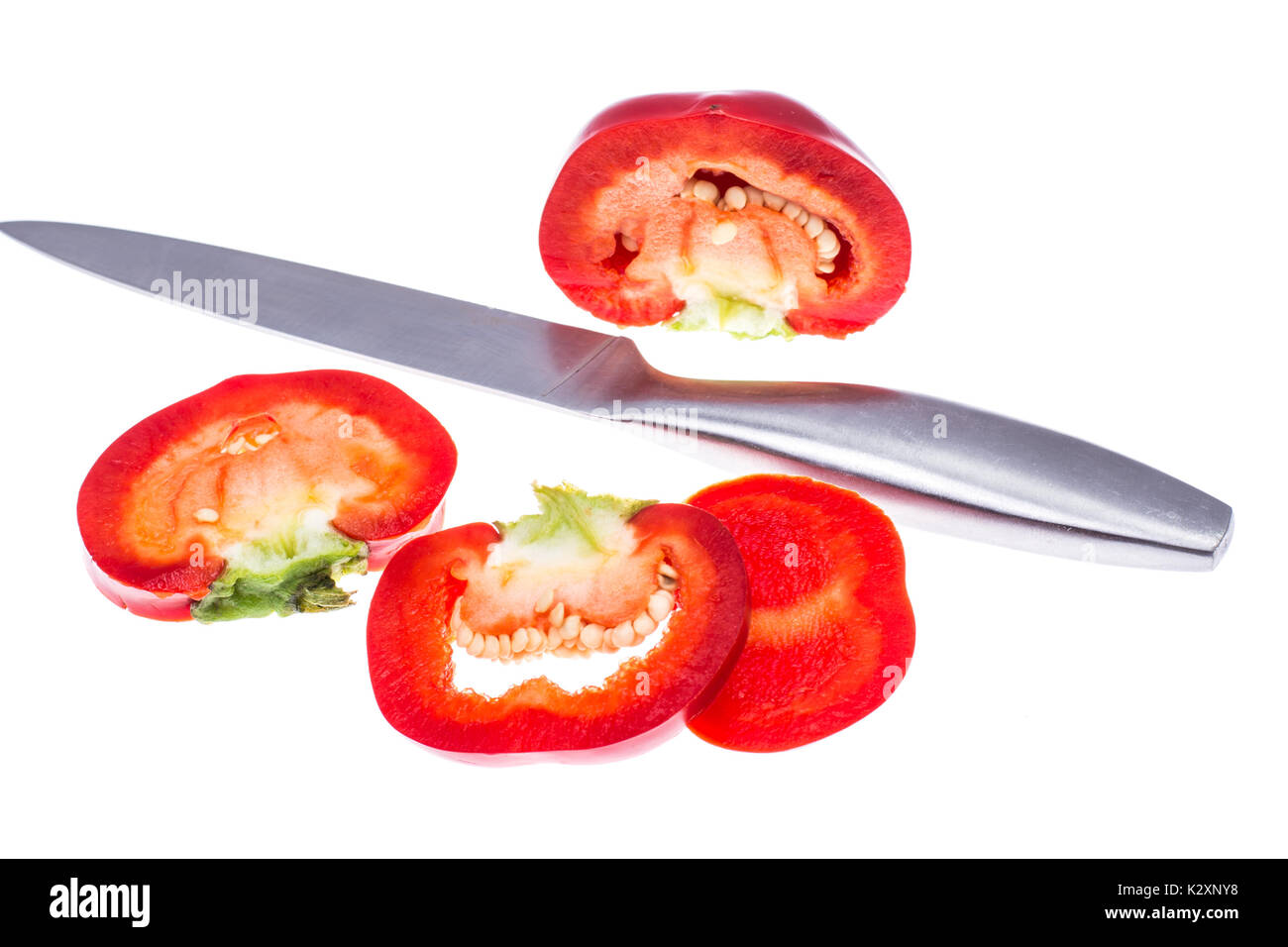Red sweet chopped round pepper, isolated on white background. Studio ...