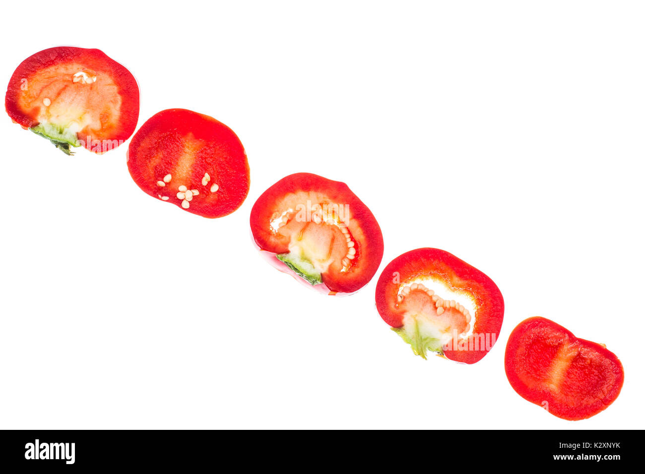 Red sweet chopped round pepper, isolated on white background. Studio ...