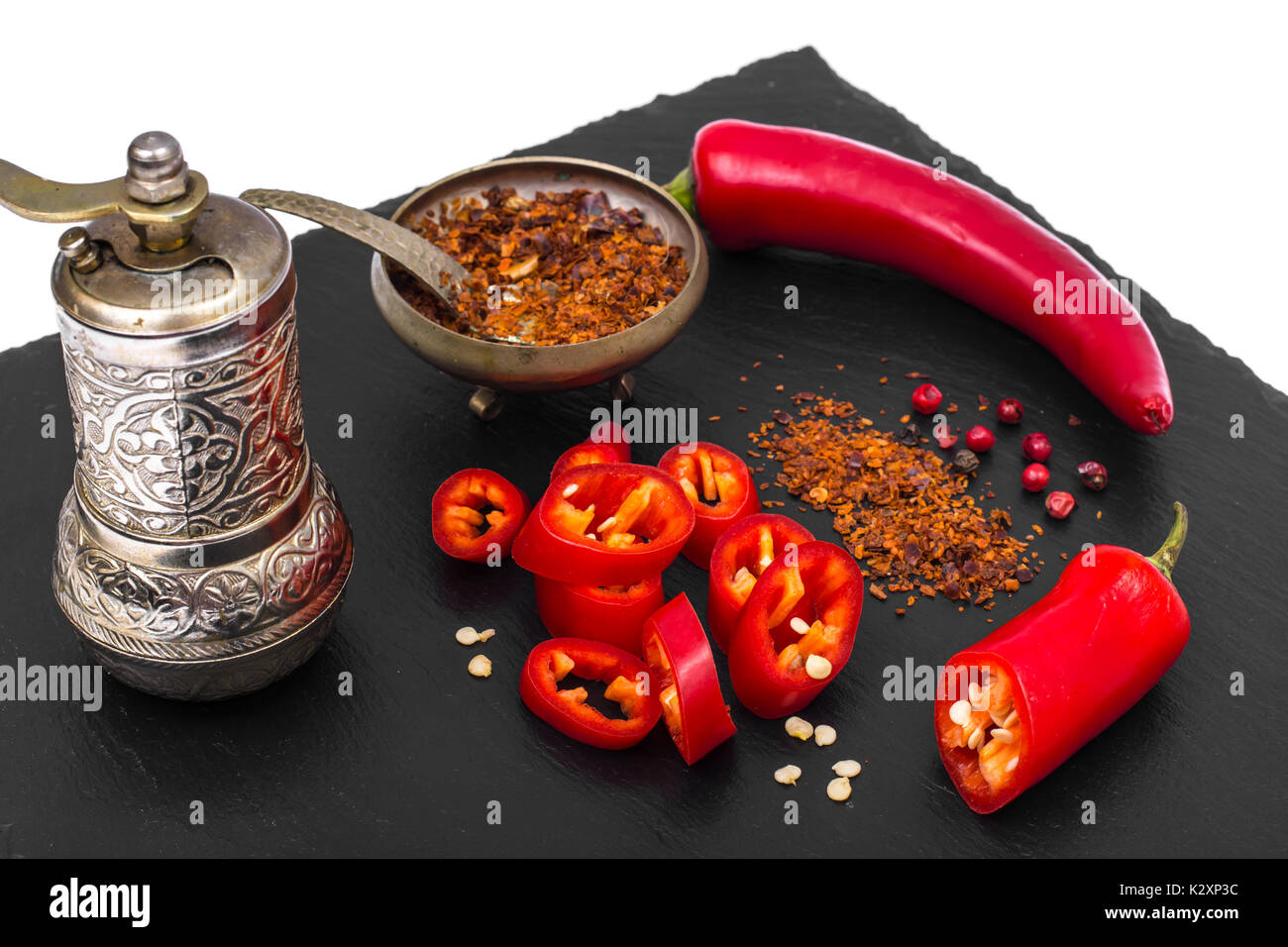 Spice in cooking red chili pepper on black stone. Studio Photo Stock ...