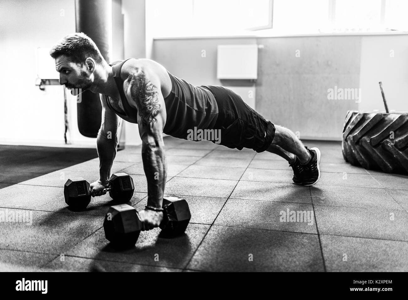 Sport man dumbbell strong Black and White Stock Photos & Images - Alamy
