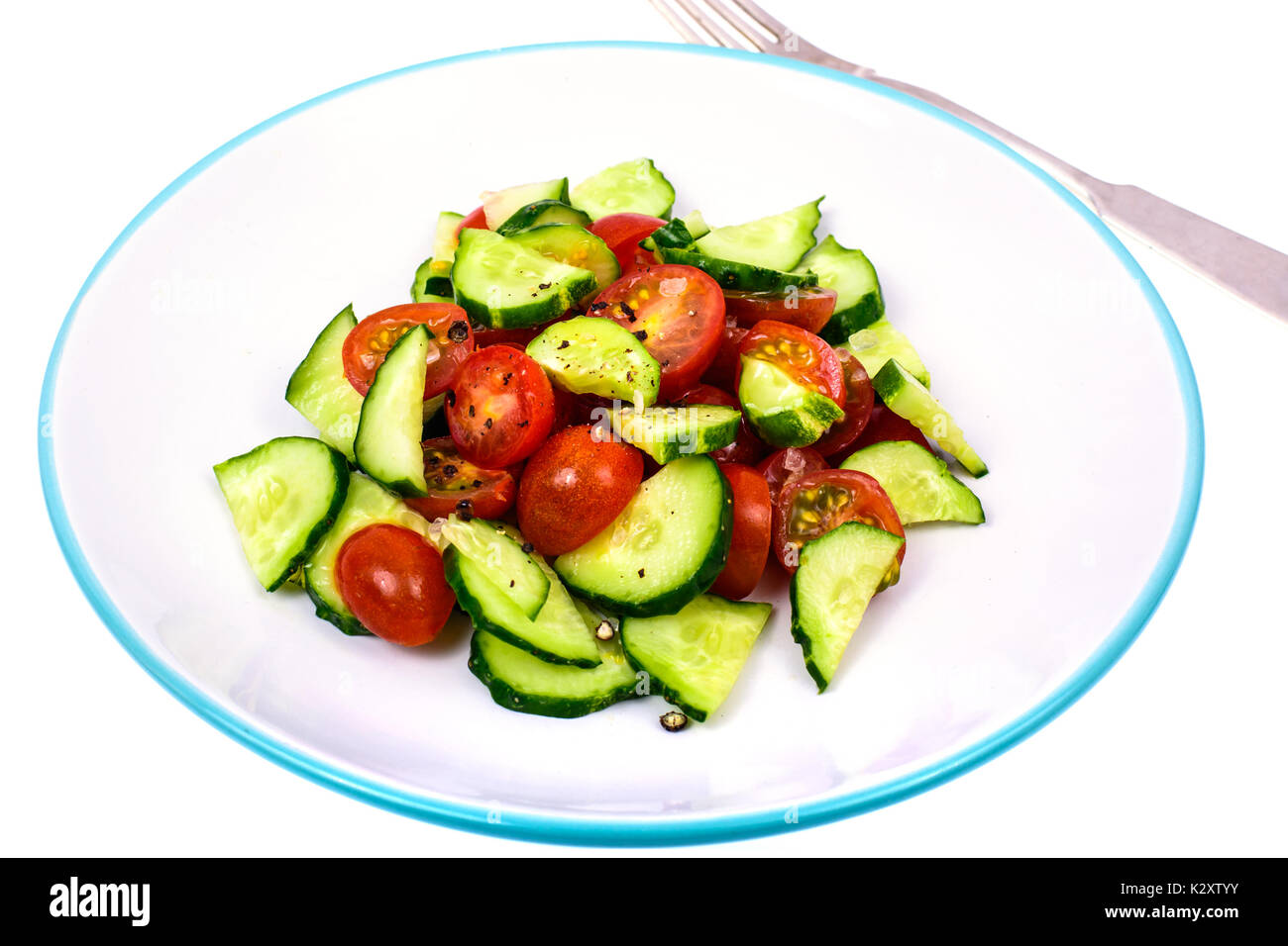 Healthy eating. Light dietary salad of fresh cucumbers and tomatoes ...