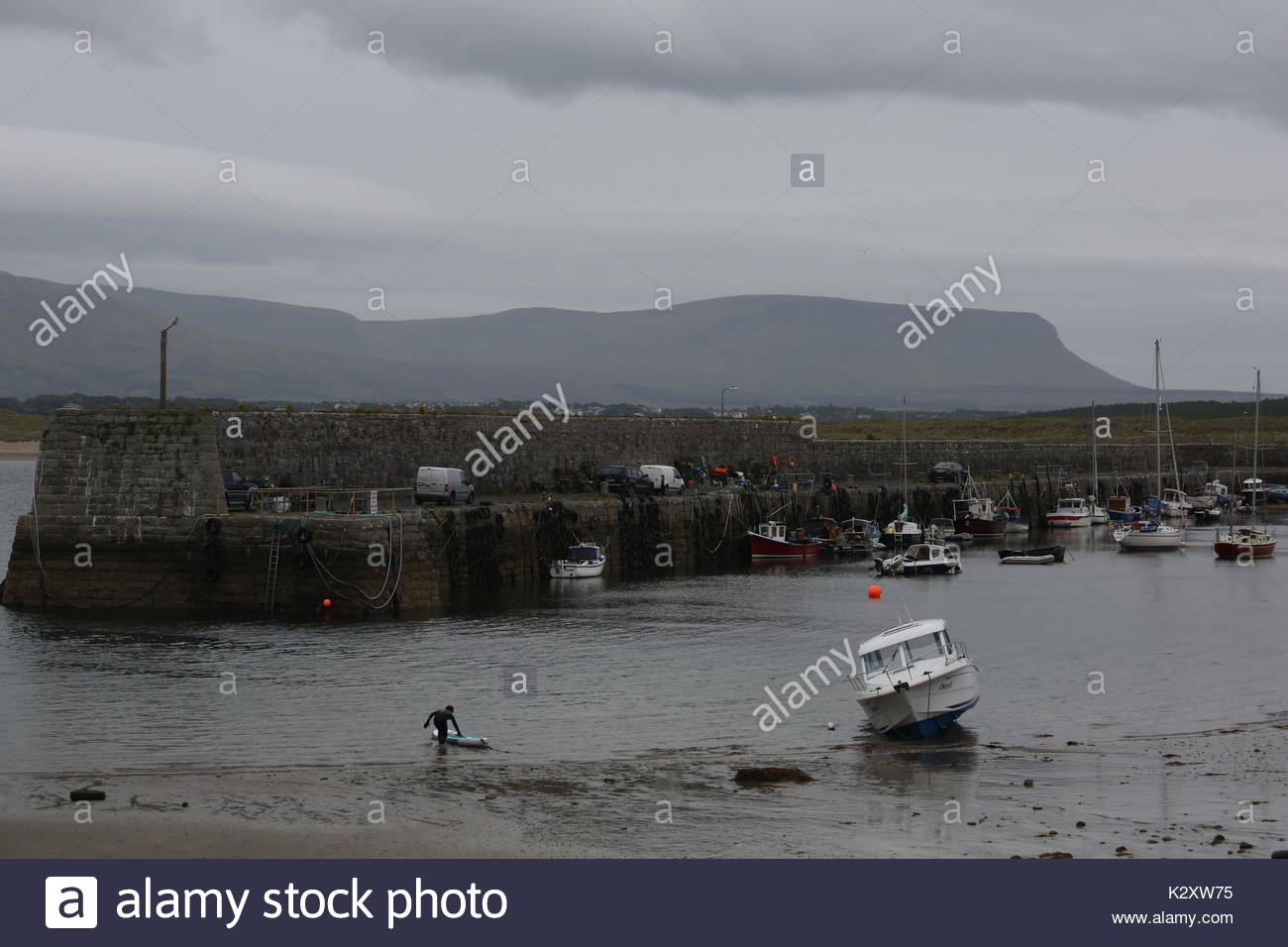 A view of Mullaghmore harbour in County Sligo, Ireland on a grey ...