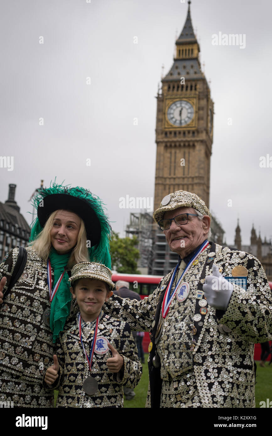Pearly King, Queen and Prince of Peckham, in their Pearly Kings clothes ...