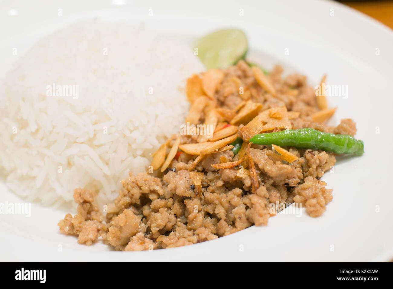 mince pork with fried rice and thai herb Stock Photo - Alamy
