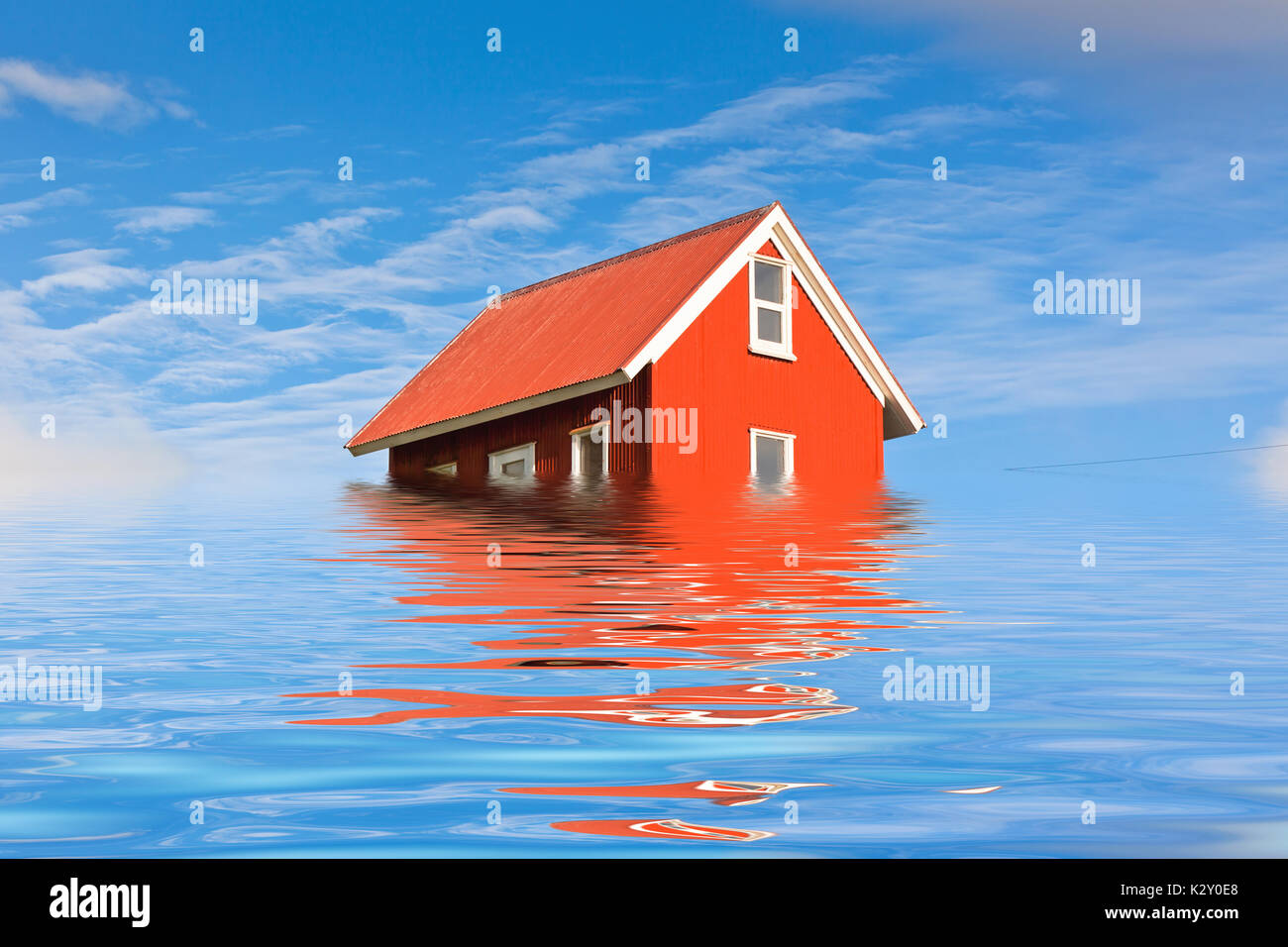 Bright Red Siding House in water flood. Blue sky background Stock Photo ...