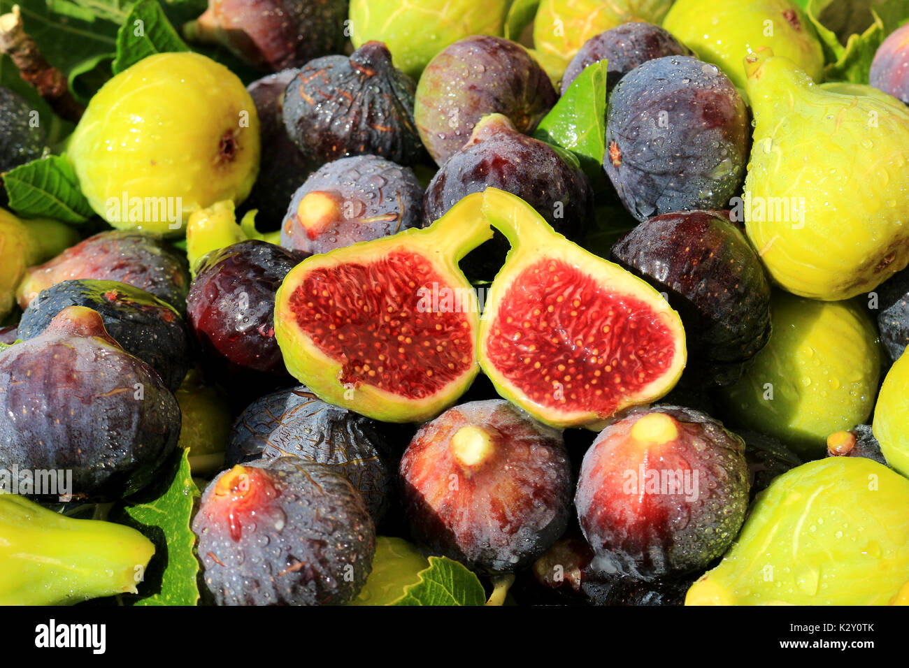 freshly picked green and blue figs, sliced fruits Stock Photo - Alamy
