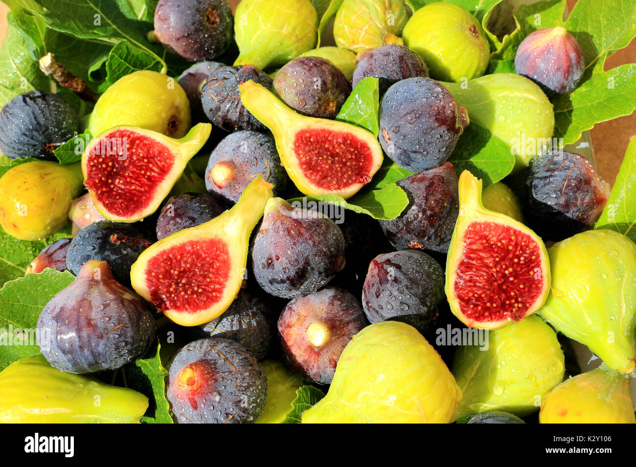 freshly picked green and blue figs, sliced fruits Stock Photo - Alamy