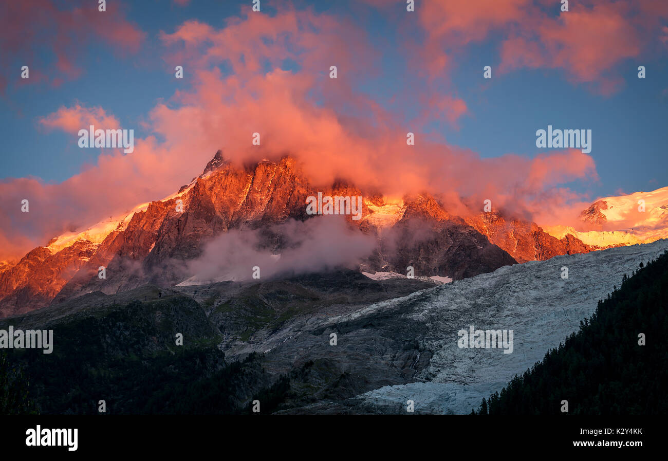 Mont Blanc mountain range glowing in dramatic light with a view on a ...