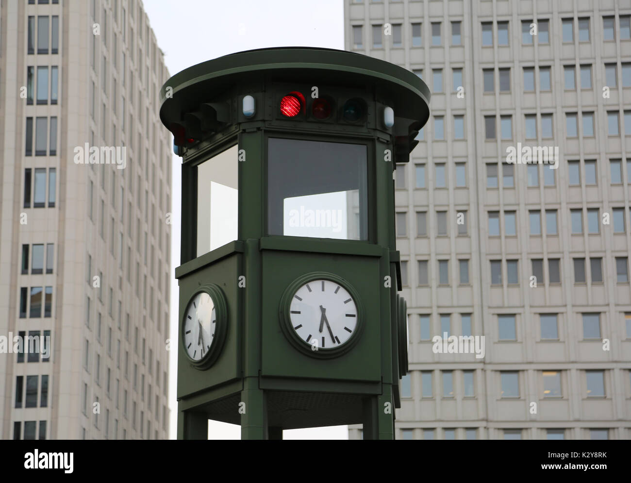 very Old traffic light with clock in the large East Berlin square ...