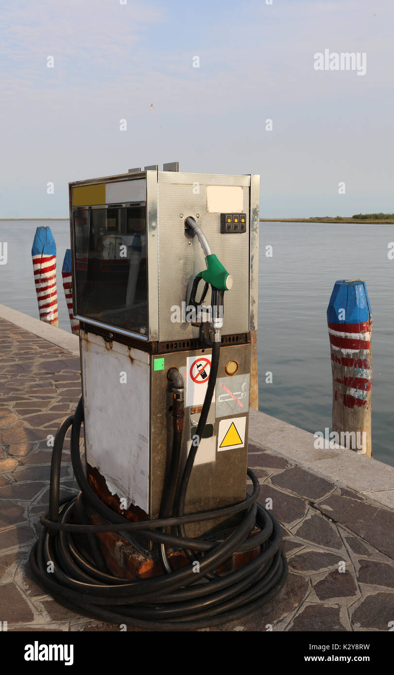 Old gas pump for filling ships near the harbor Stock Photo - Alamy
