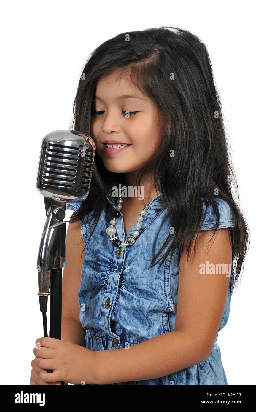 Beautiful hispanic girl singer performing at a concert Stock Photo - Alamy
