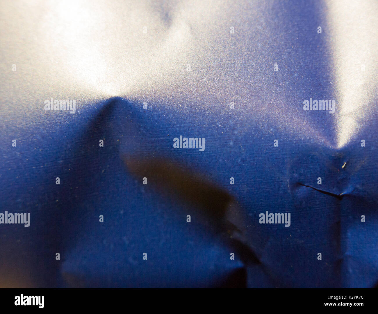 close up texture of blue metal crisp packet; England; UK Stock Photo ...